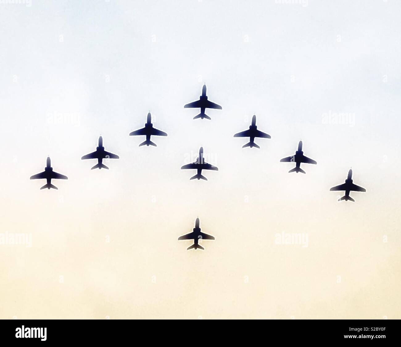 An arrow of fighter jets, RAF100 flypast, London Stock Photo - Alamy