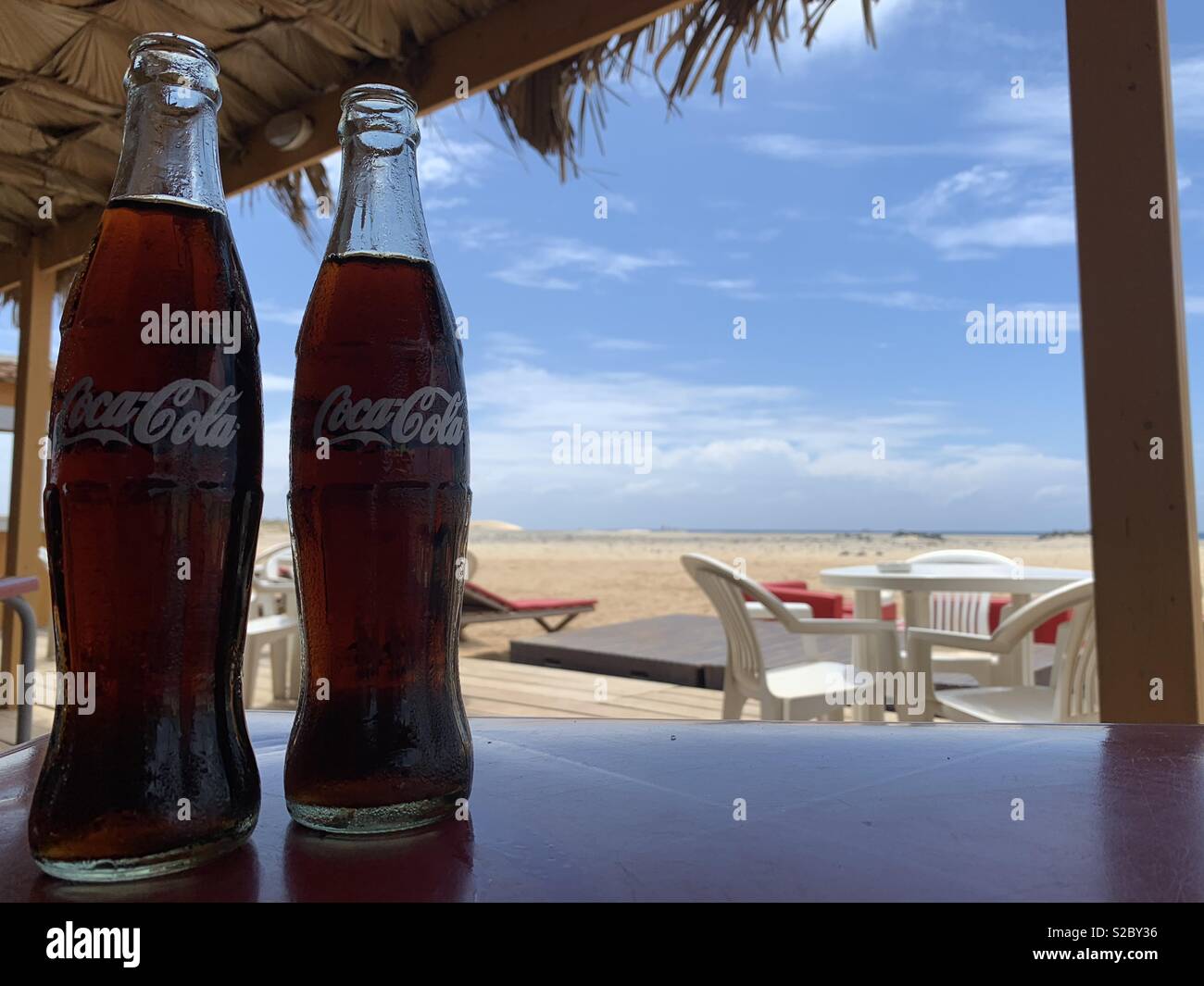 Coca Cola at the beach Stock Photo - Alamy