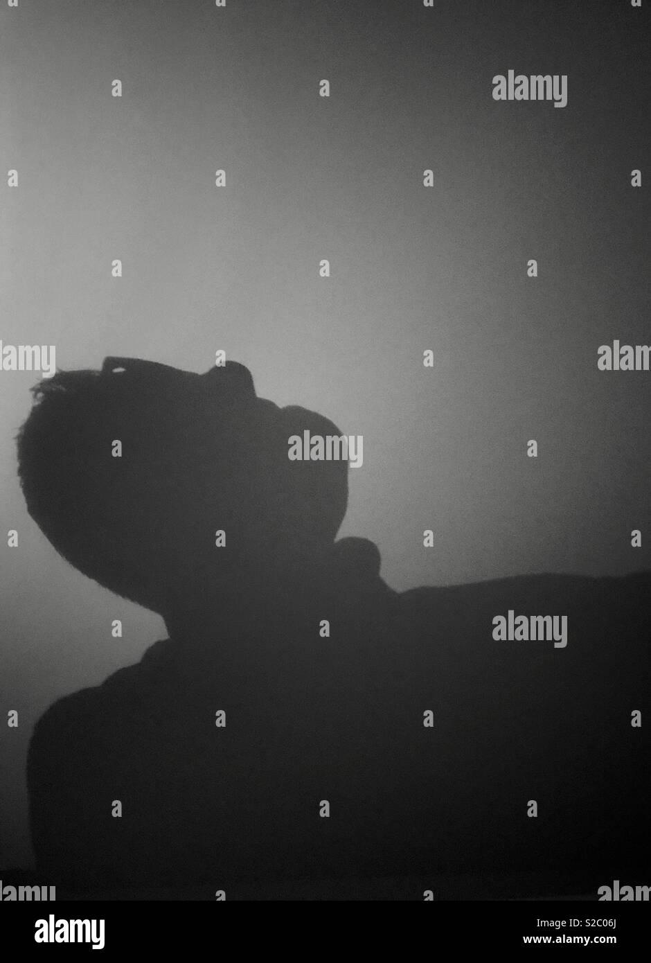 Man with glasses silhouette hi-res stock photography and images - Alamy