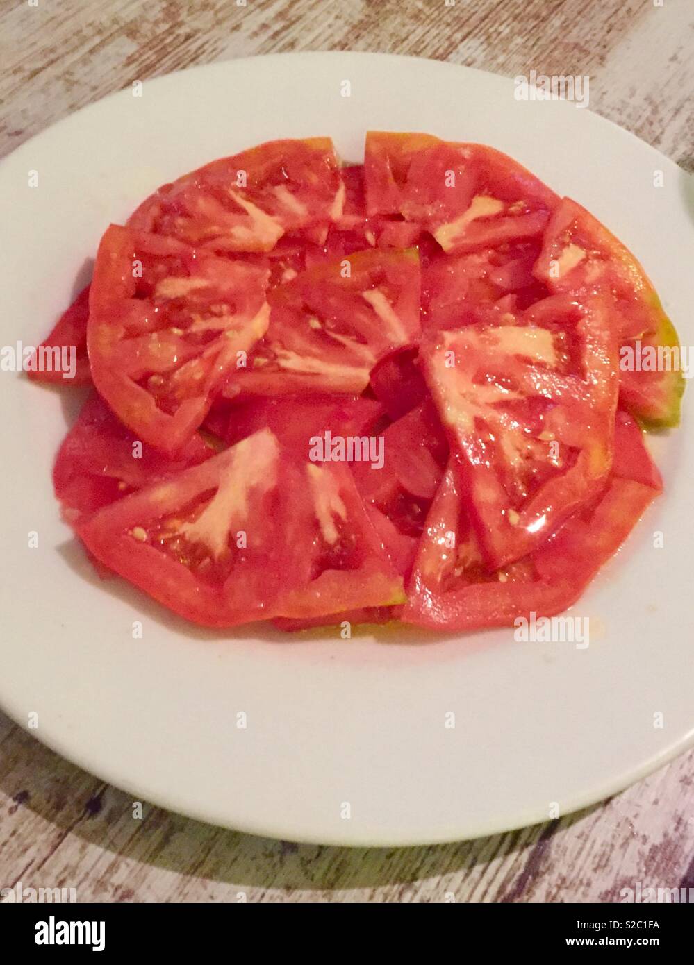 Plate tomatoes hi-res stock photography and images - Alamy