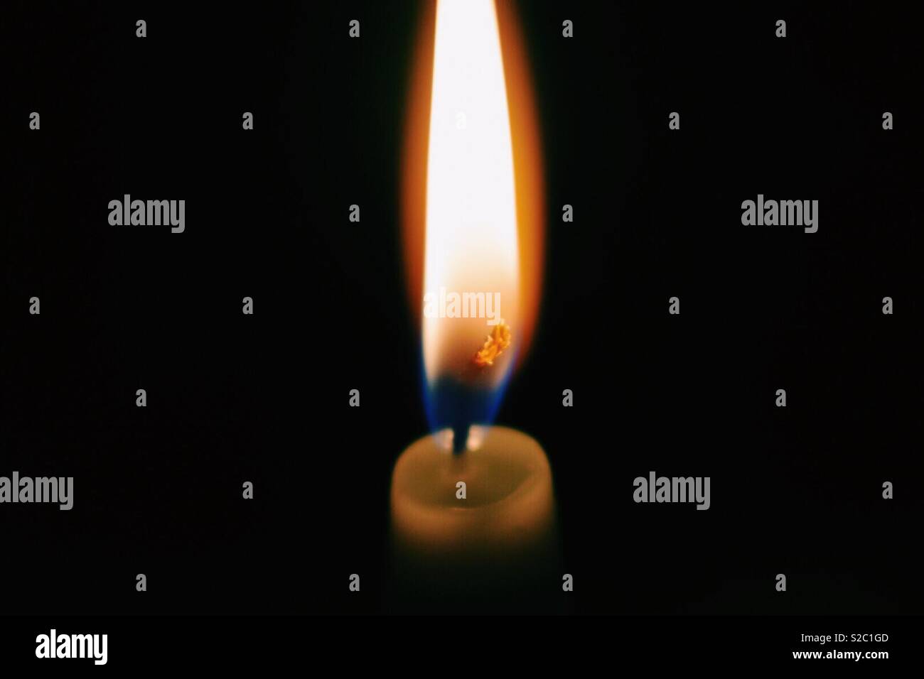 Single candle blue hi-res stock photography and images - Alamy