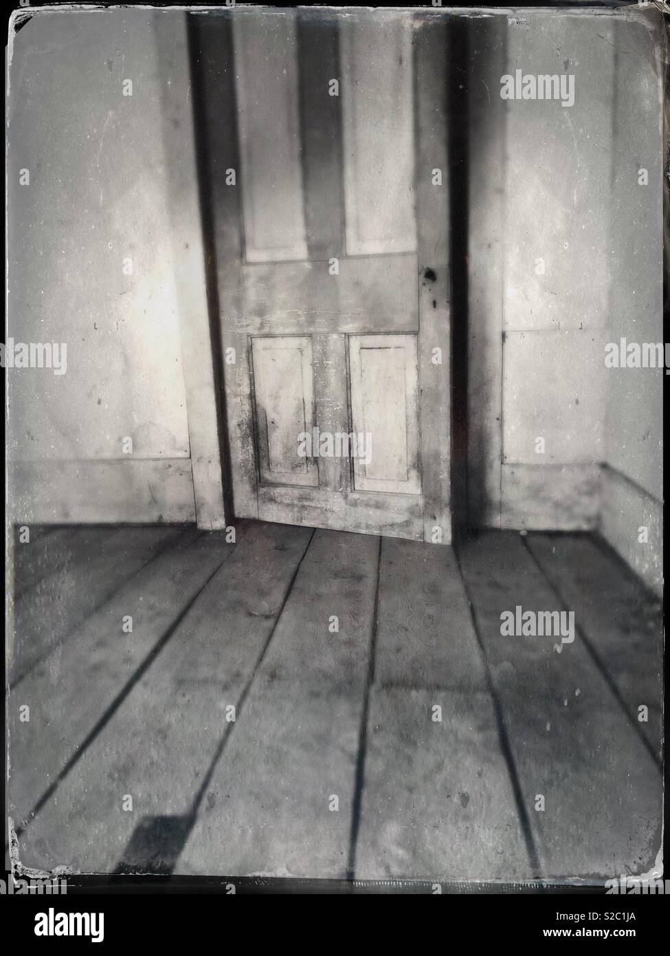 Door ajar in old house Stock Photo - Alamy