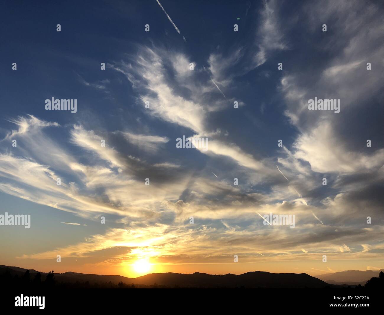 Wispy sunset hi-res stock photography and images - Alamy