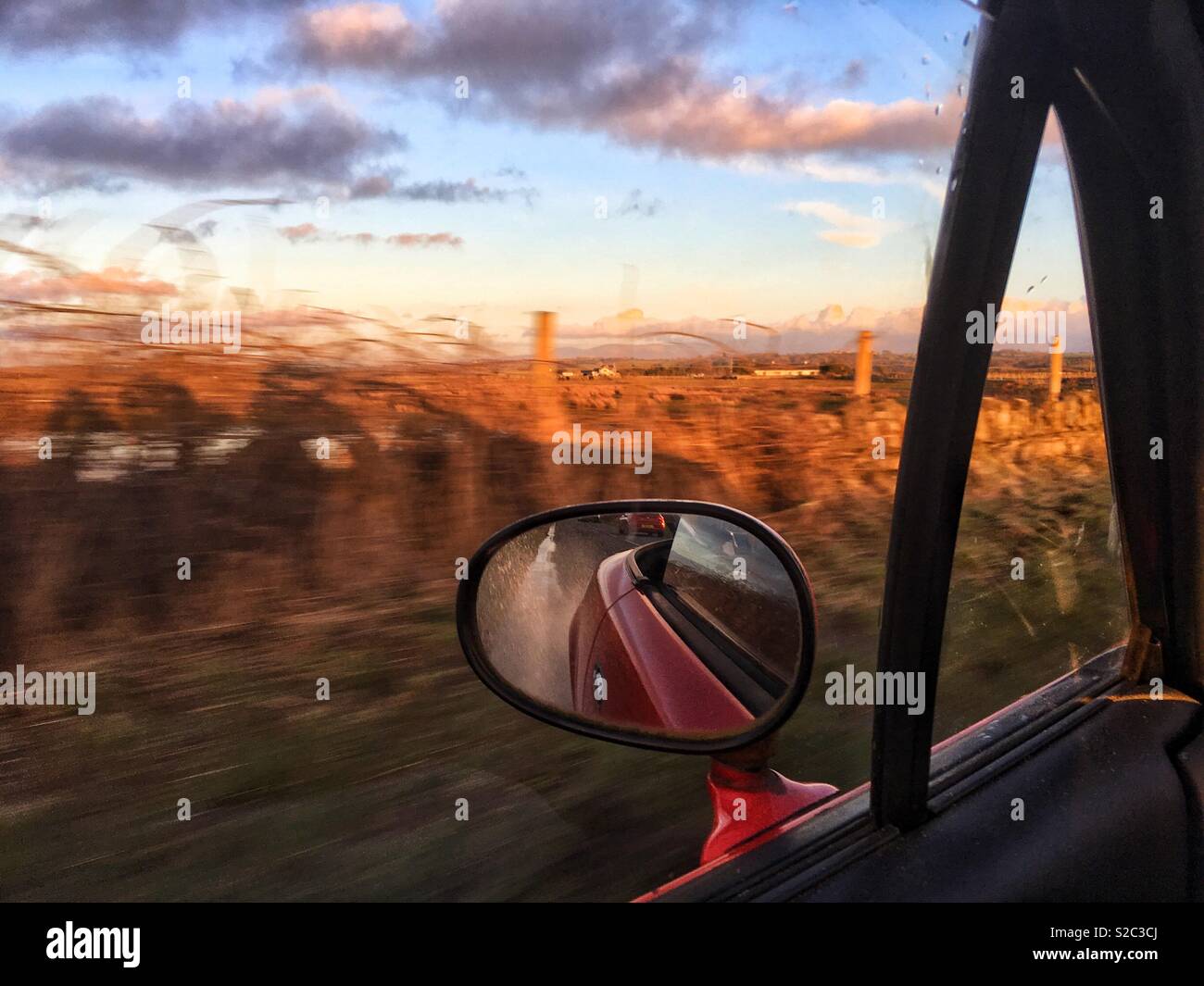 Driving in sunshine with shadow of car Stock Photo - Alamy