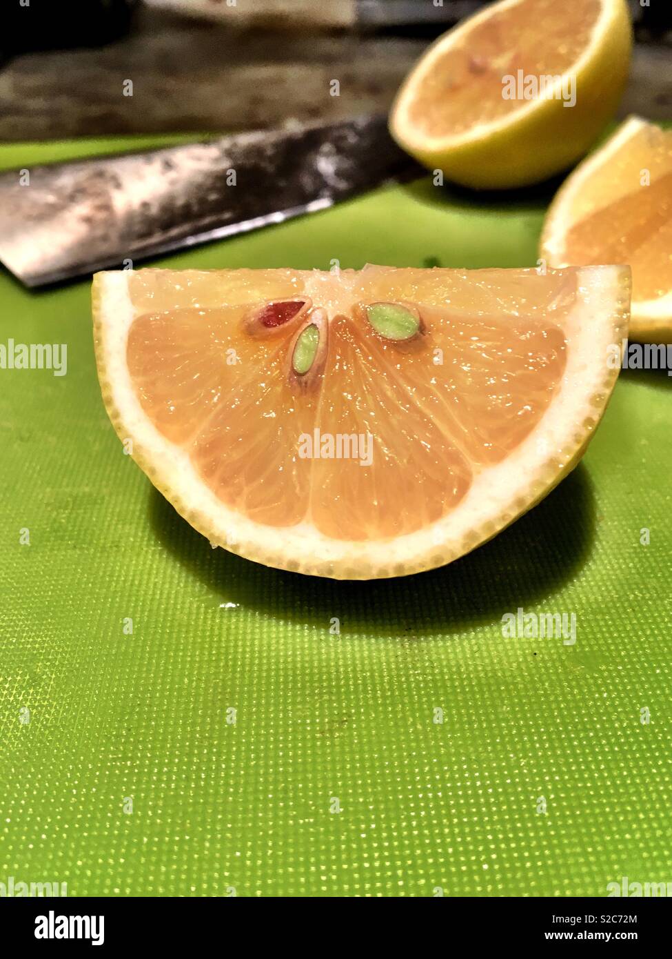 Cutting lemons seed showing Stock Photo - Alamy