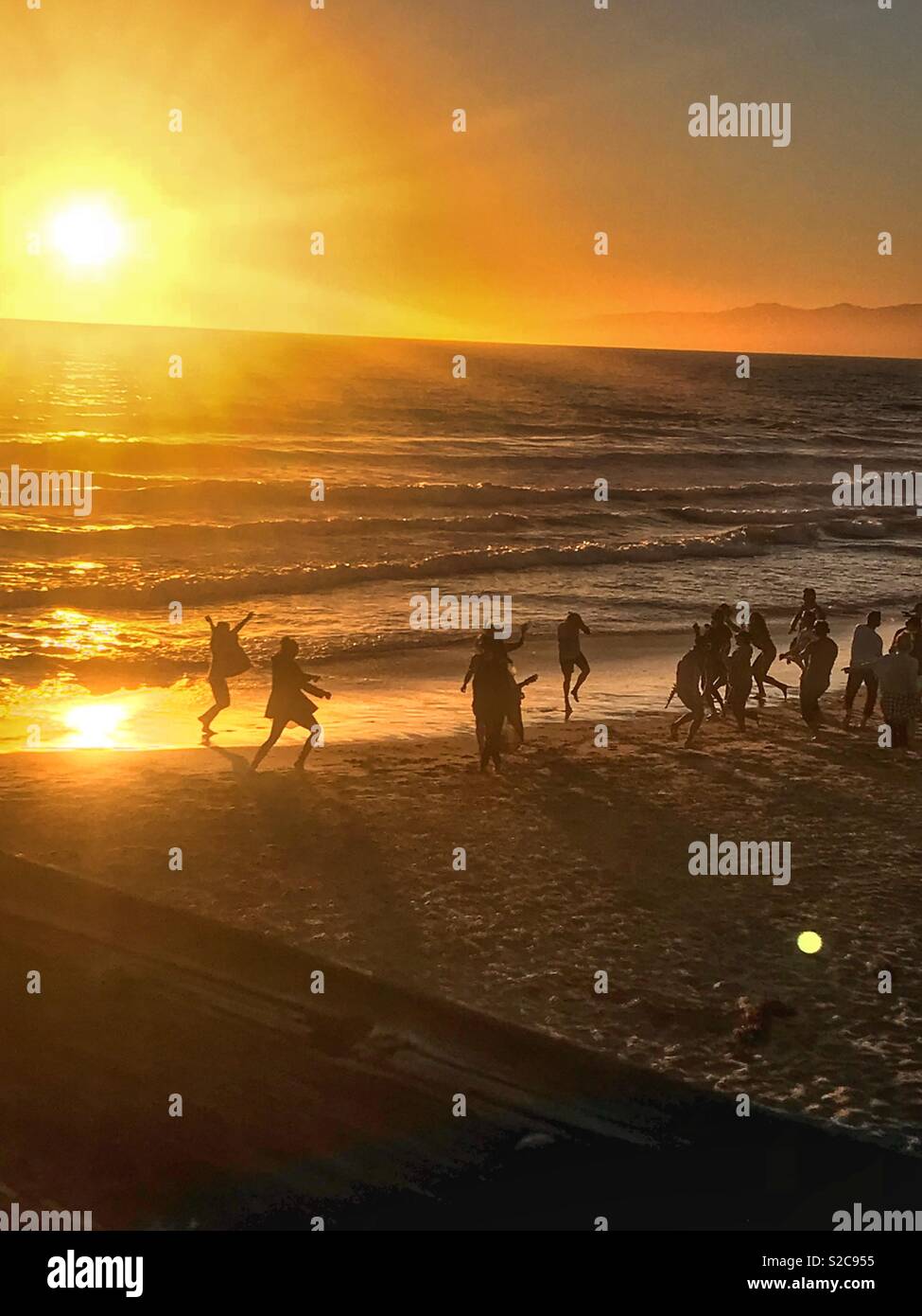 Sunset silent disco Stock Photo - Alamy