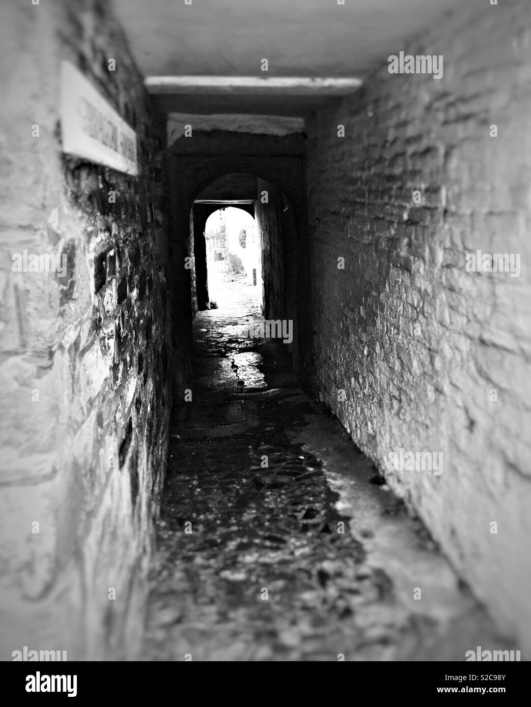 Dark passageway in black and white Stock Photo - Alamy