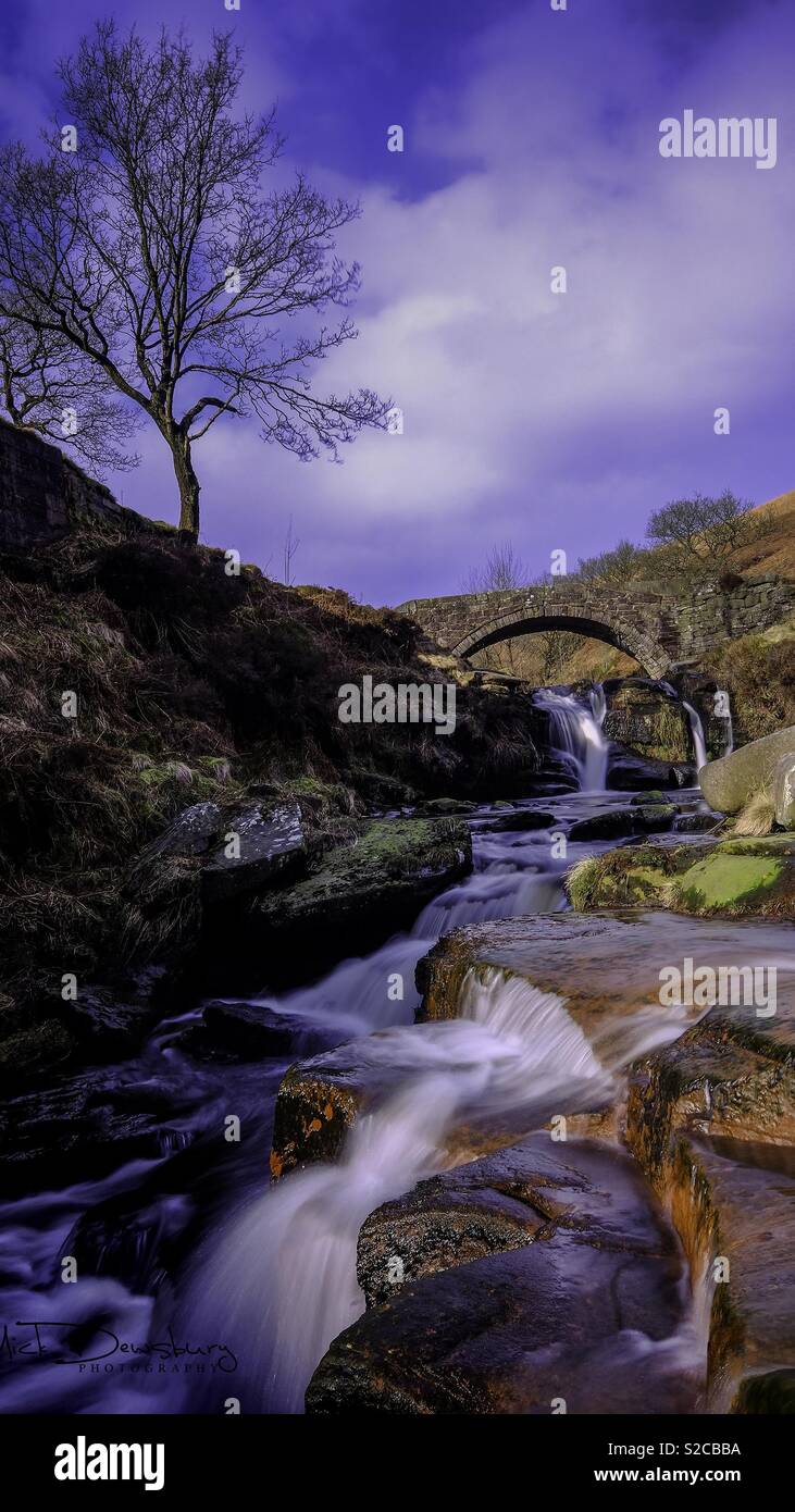 Bridge and waterfall Stock Photo - Alamy