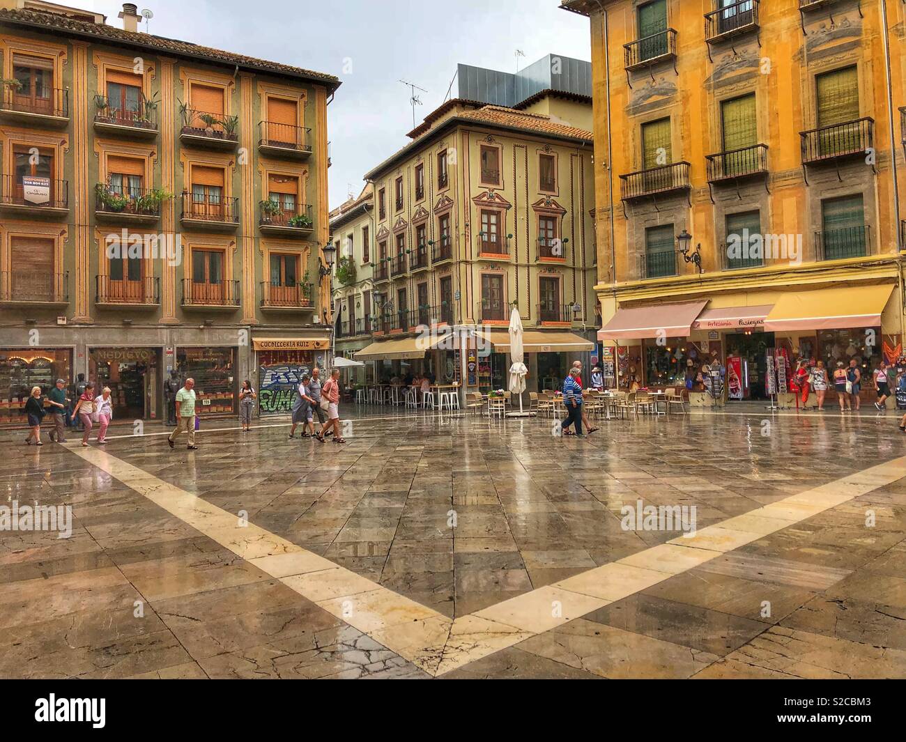 A public square in Granada, Spain on a rainy day Stock Photo - Alamy