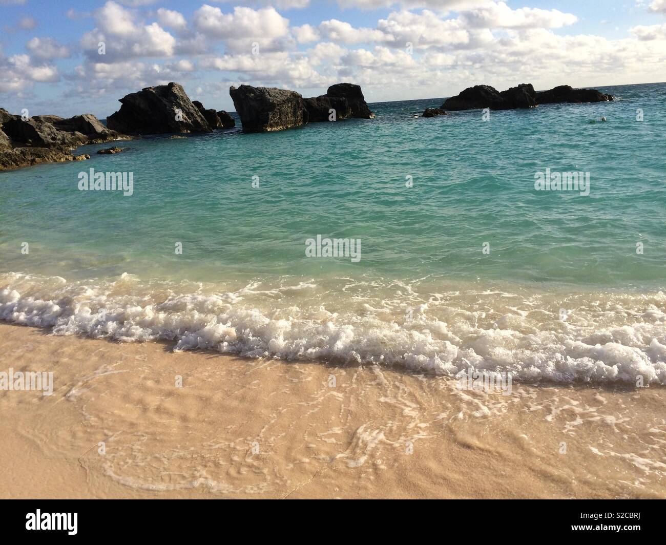 Boulders beyond the beach in Bermuda Stock Photo - Alamy
