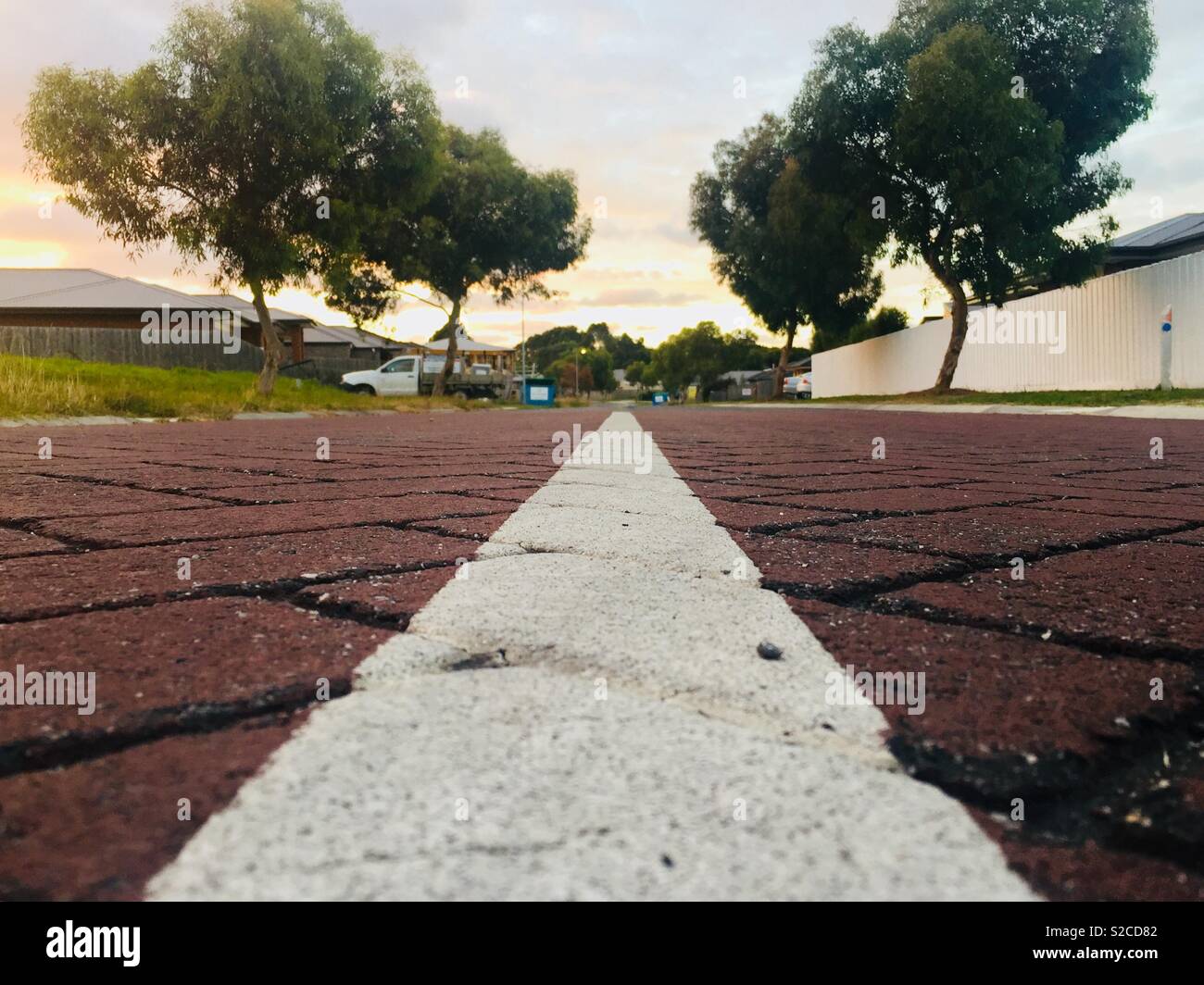Road at twilight Stock Photo - Alamy