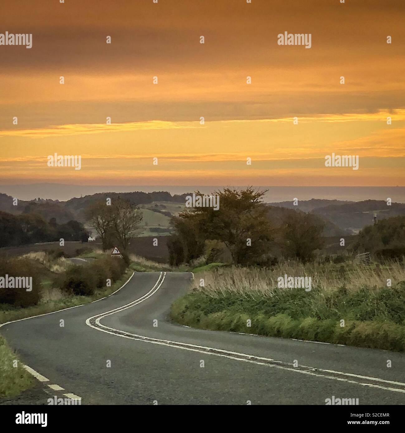 Road to the sun rise Stock Photo - Alamy