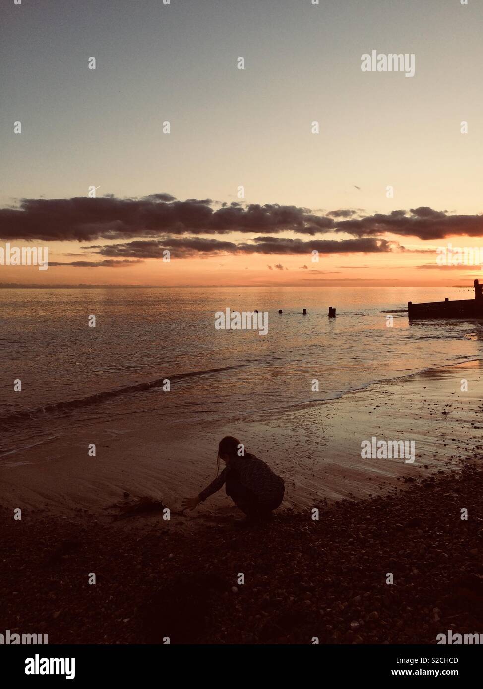 Girl on beach Stock Photo - Alamy