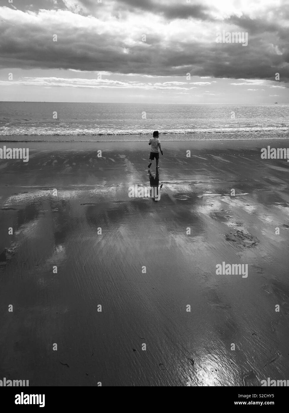 Running towards the storm Stock Photo - Alamy