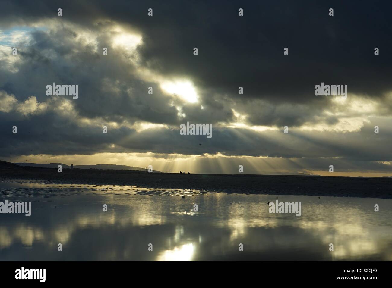 Beach sun rays! Stock Photo - Alamy