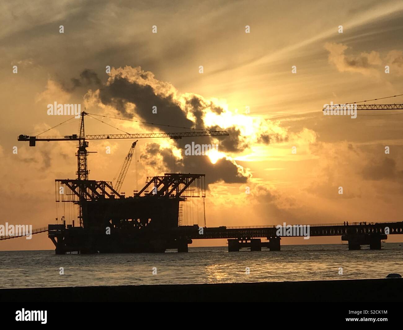 Sun rise behind the Construction of Maldives and China friendship ...