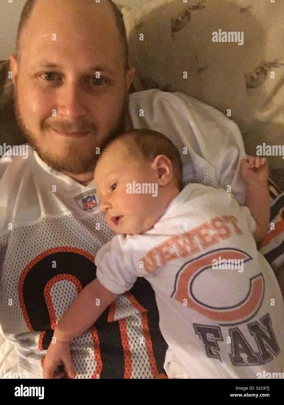 Game time baby Stock Photo - Alamy