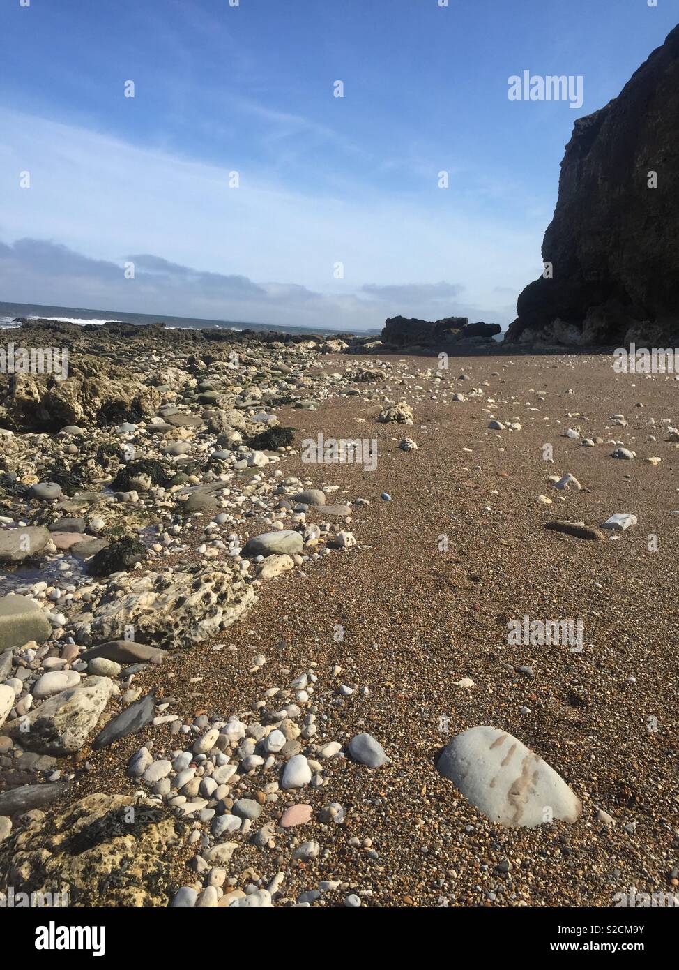 Beach pebbles cliff hi-res stock photography and images - Alamy