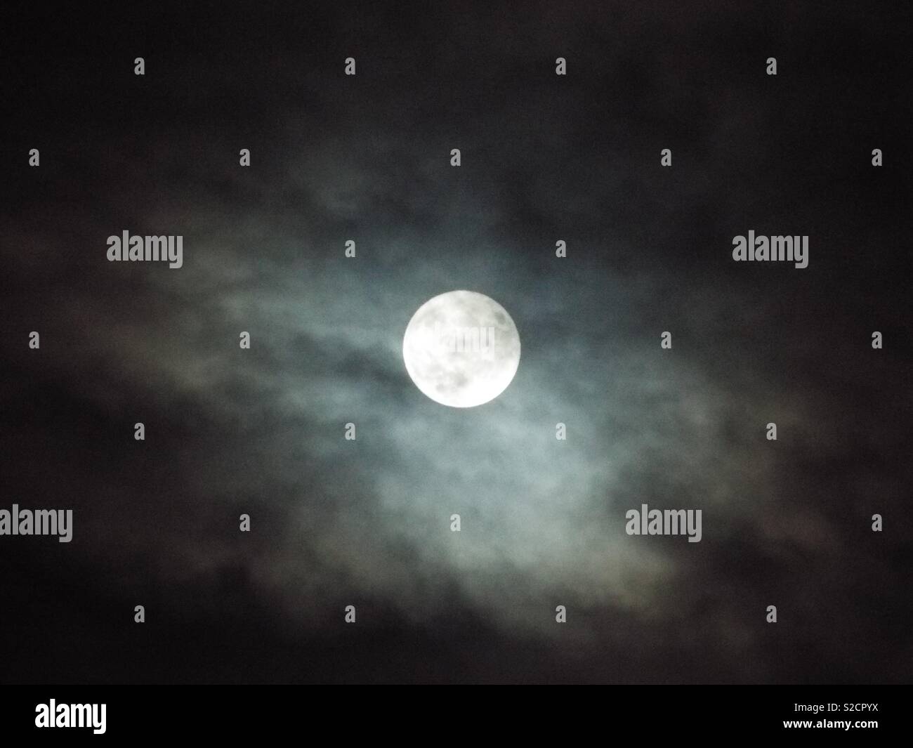 Clouded moon hi-res stock photography and images - Alamy