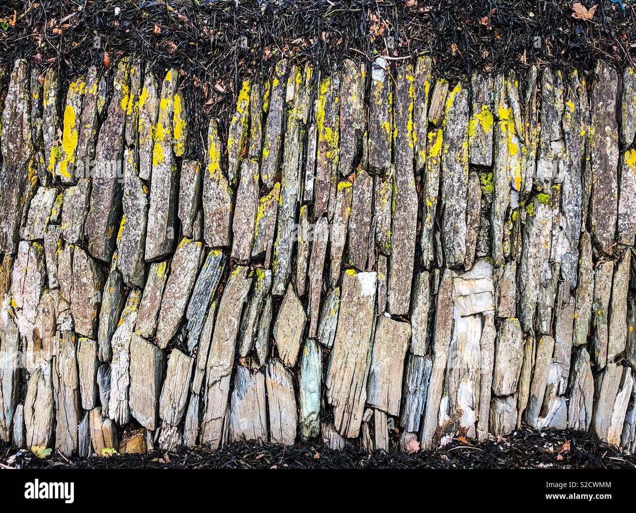 Full frame background texture of Cornish granite slabs topped with ...