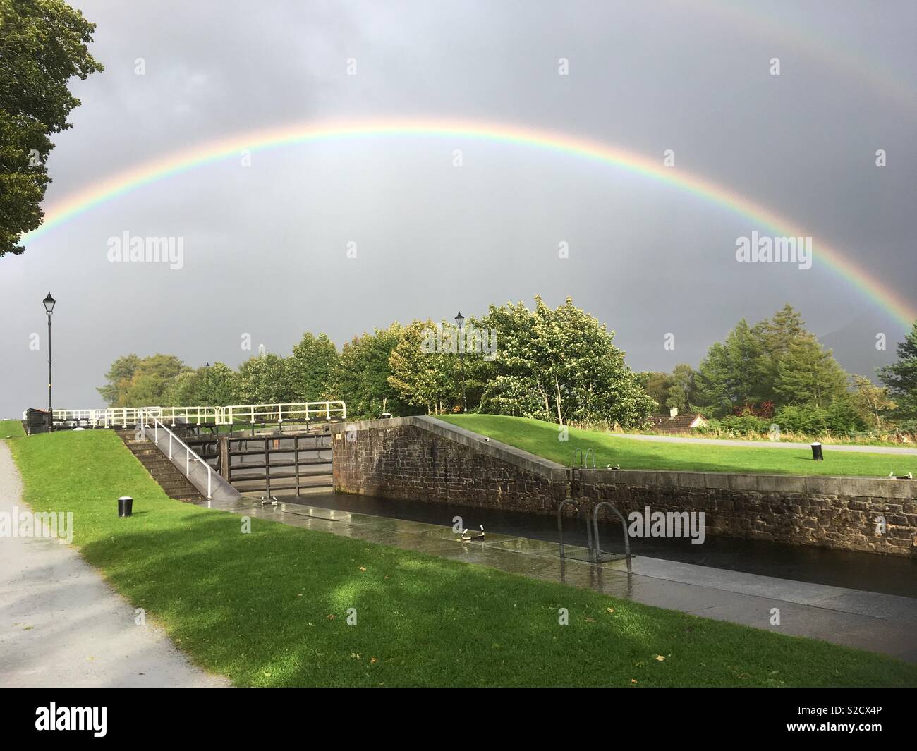 Rainbow above Neptune’s staircase, Scotland. September 2018 Stock Photo ...