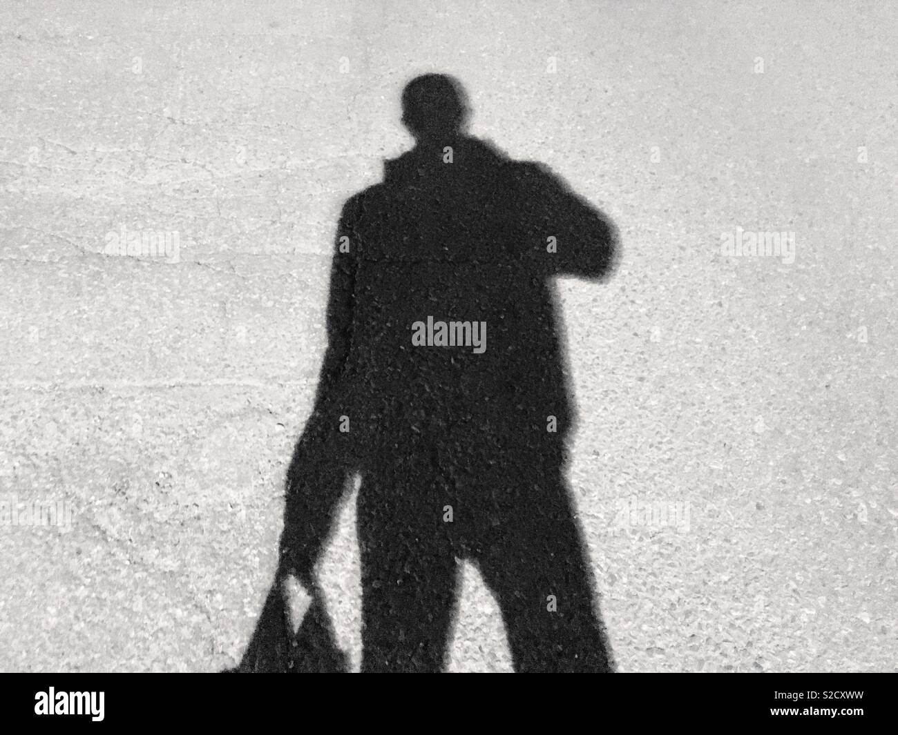 Shadow of men hi-res stock photography and images - Alamy