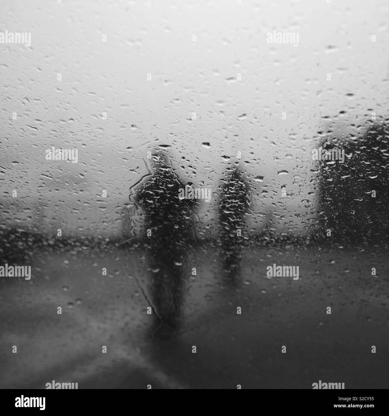 Standing in the rain Black and White Stock Photos & Images - Alamy