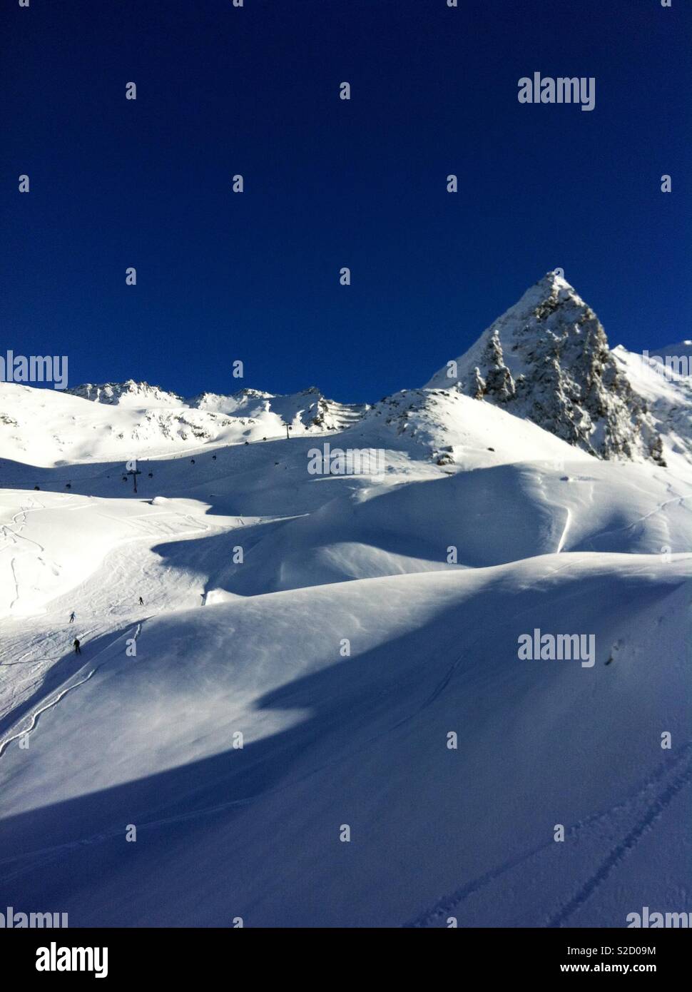 Snow covered ski area Stock Photo - Alamy