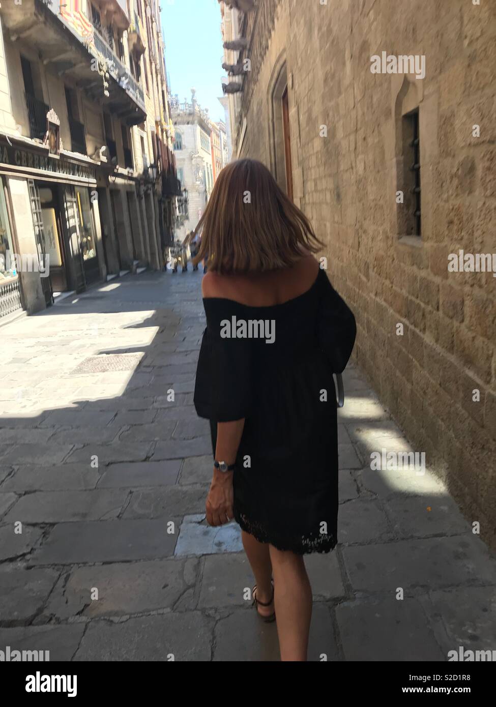 Lady walking away hi-res stock photography and images - Alamy