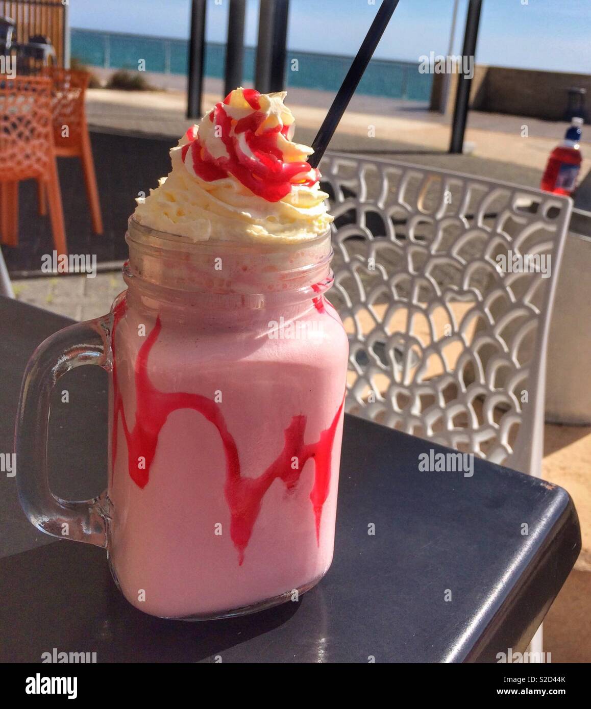 Milkshake in the sun Stock Photo - Alamy