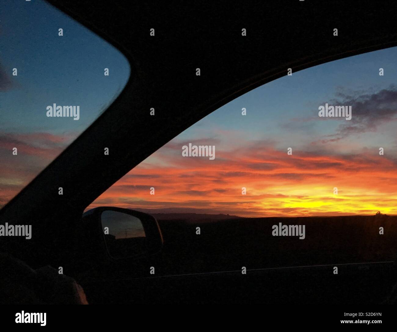 Sunset from the car Stock Photo - Alamy