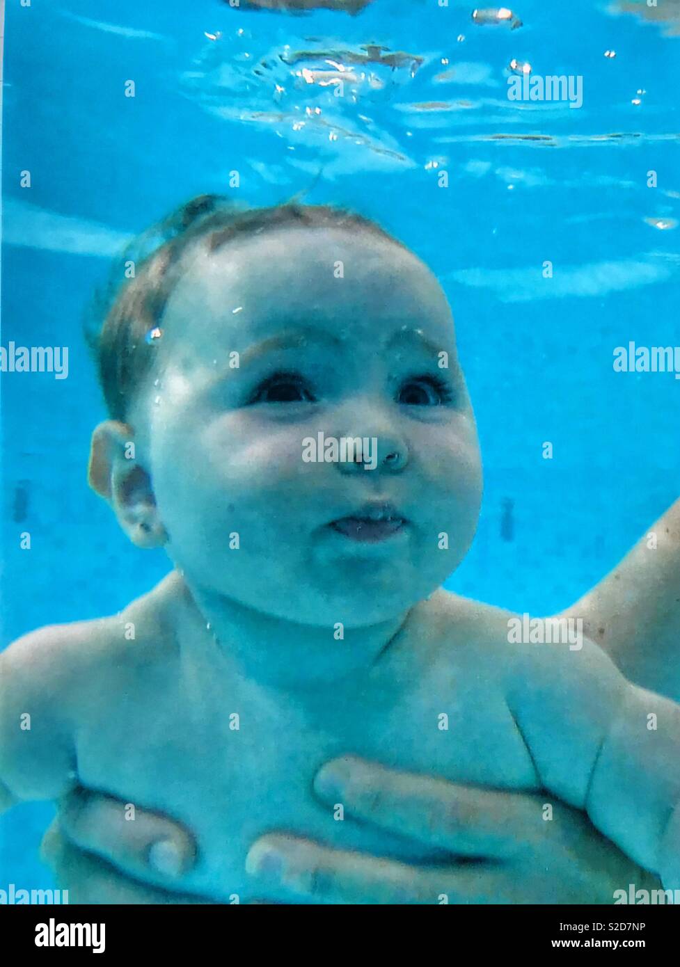 Baby swimming underwater hi-res stock photography and images - Alamy