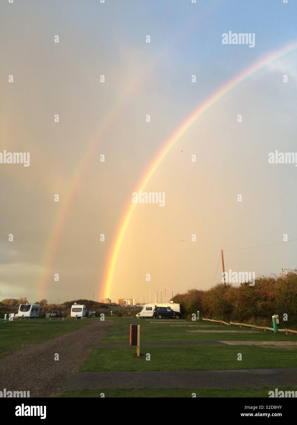 Rainbow sun rain sky hi-res stock photography and images - Alamy