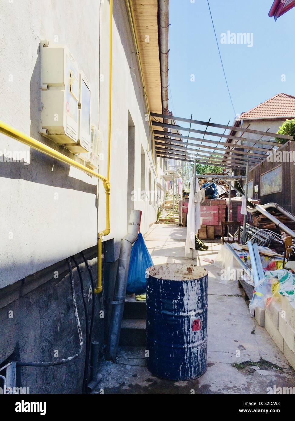 Outside a building with lots of mess during renovation in Romania Stock ...