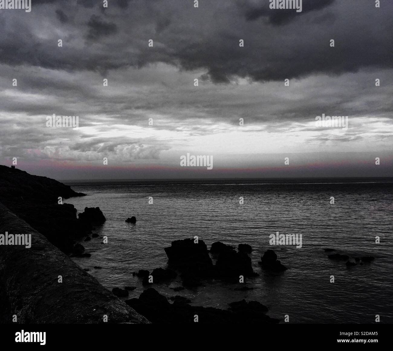 Dark rocky cliffs hi-res stock photography and images - Alamy