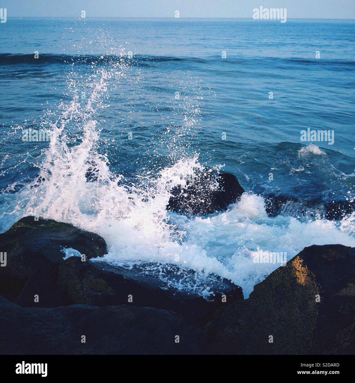 Ocean splash, water splash, ocean wave crashing on rock, beach Stock ...