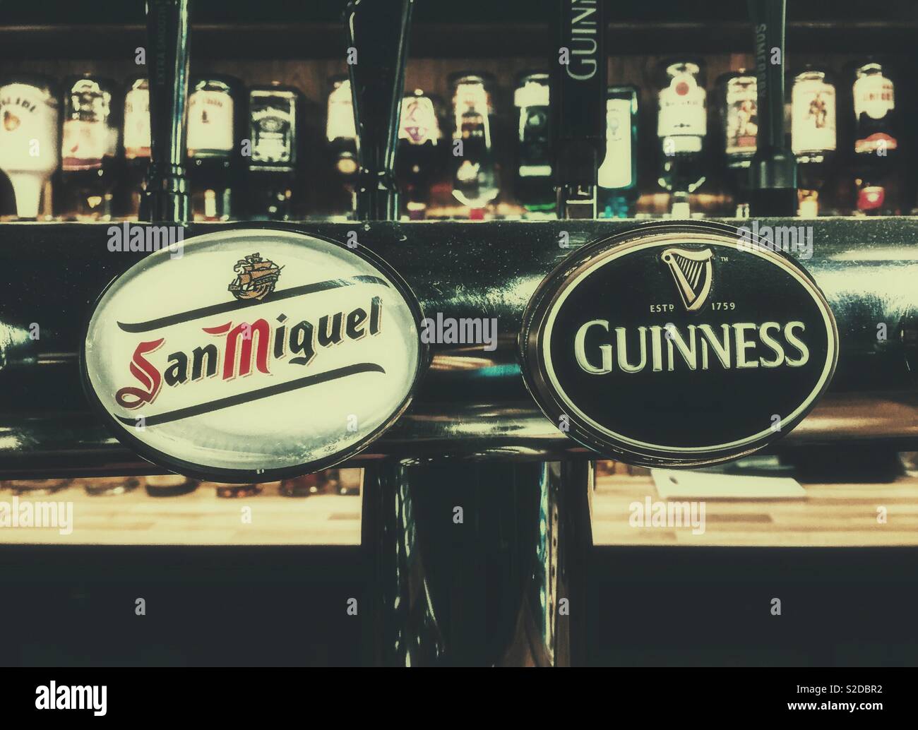 Guinness san miguel beer pumps hi-res stock photography and images - Alamy