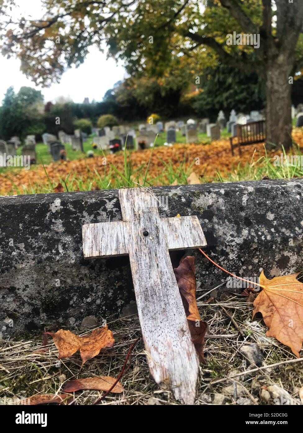 Wooden cross in graveyard hi-res stock photography and images - Alamy