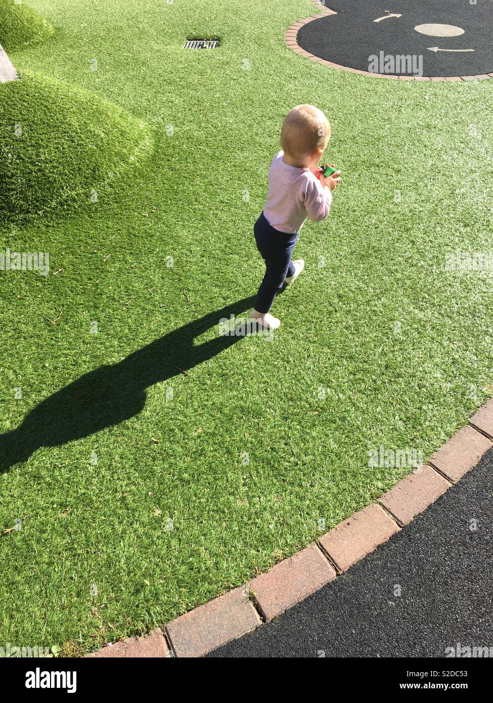 baby in playground Stock Photo - Alamy