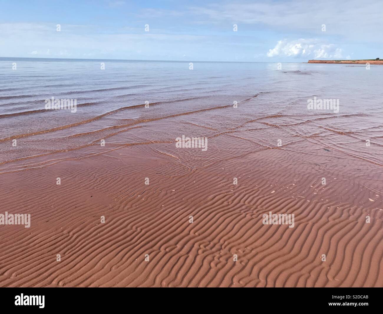 Red sands beach hi-res stock photography and images - Alamy