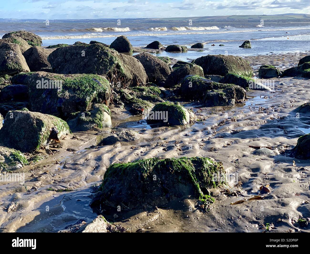 Waves receding on beach hi-res stock photography and images - Alamy