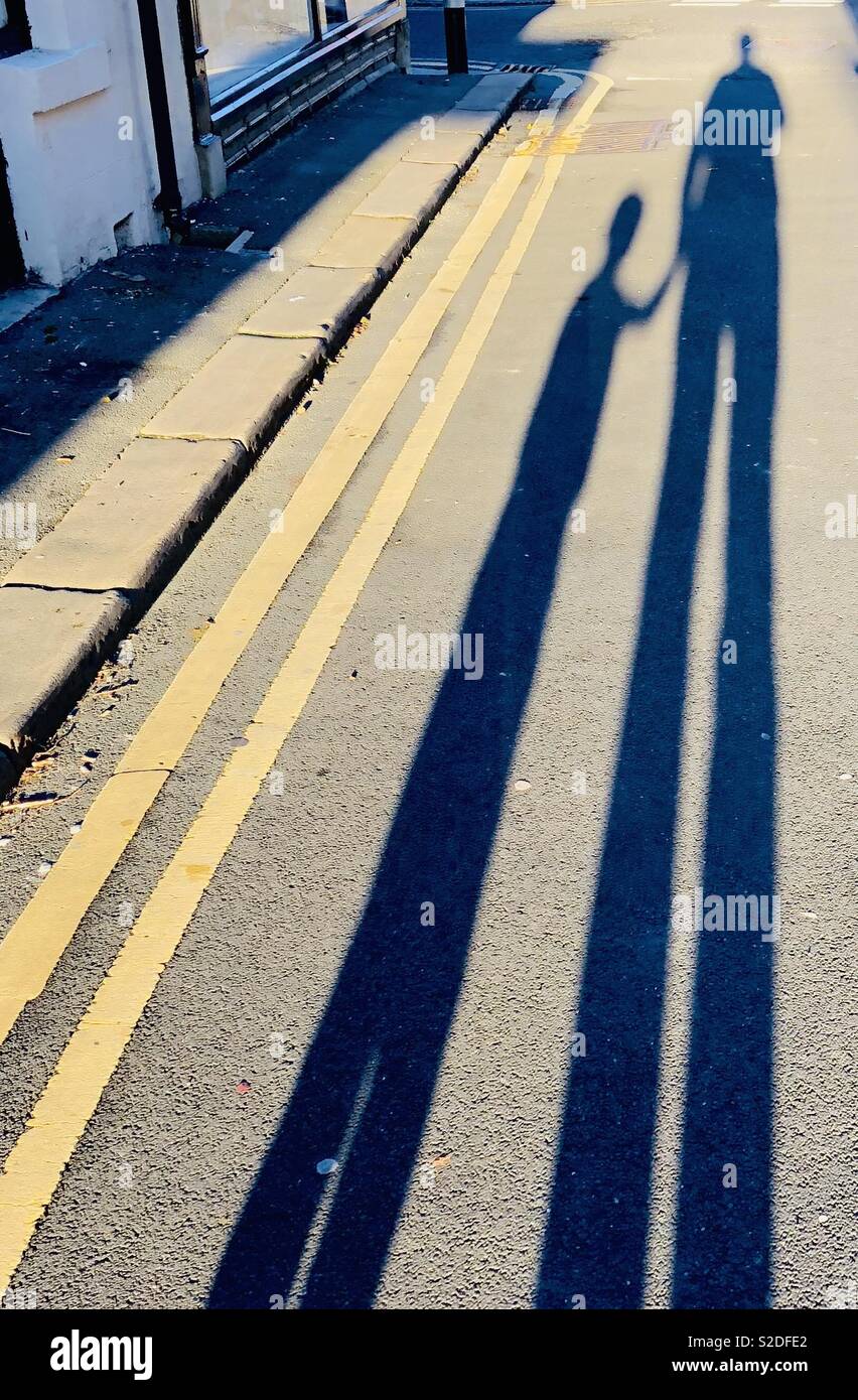 Father son shadow hi-res stock photography and images - Alamy