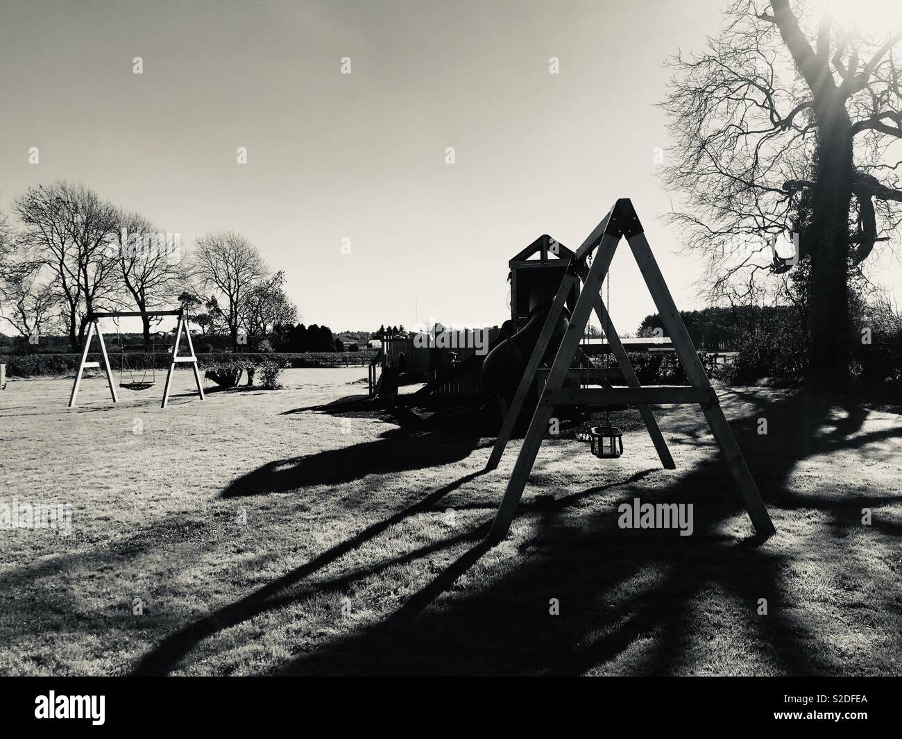 Playground swing slide hi-res stock photography and images - Alamy