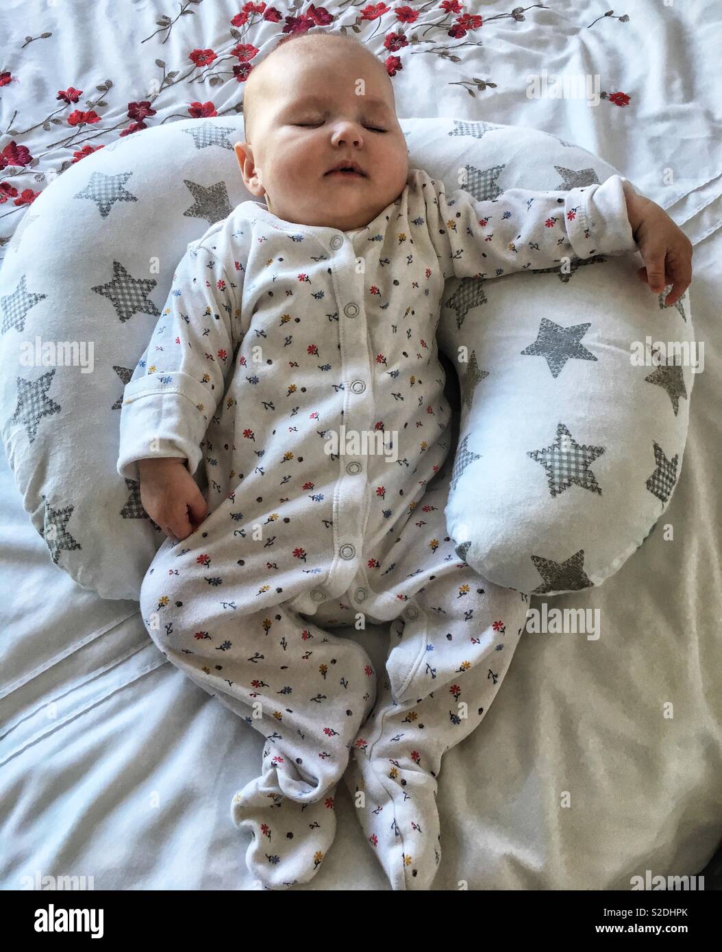 Peacefully sleeping baby girl Stock Photo - Alamy