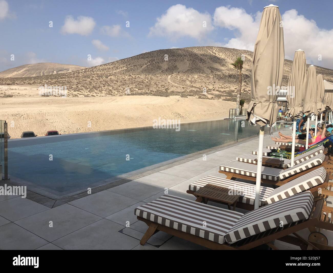 Swimming pool in the desert Stock Photo - Alamy