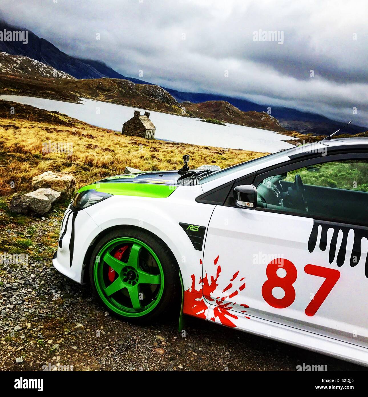 Sports car at Loch Stack Stock Photo - Alamy
