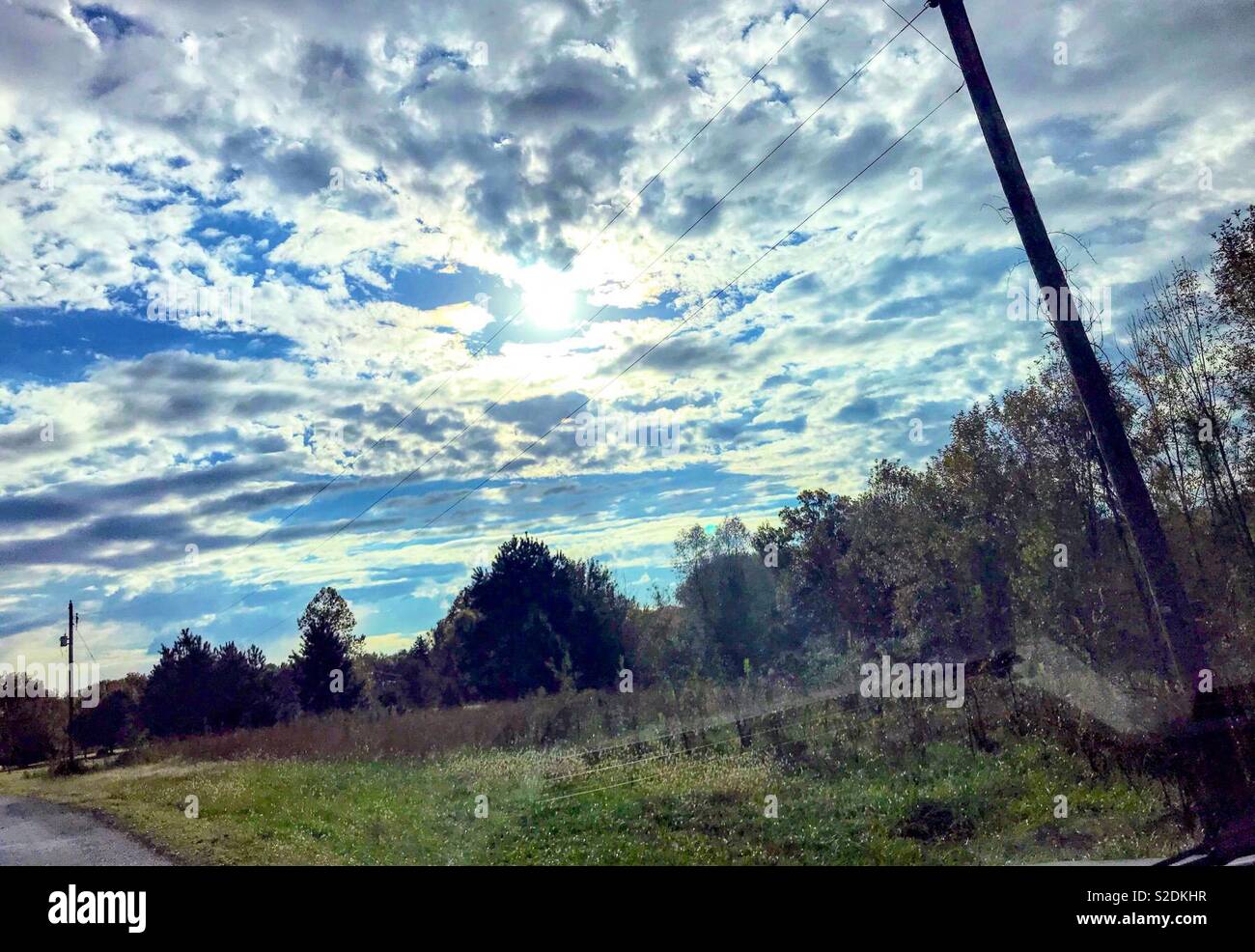 Clouds illuminated by the Sun on a call day Stock Photo - Alamy