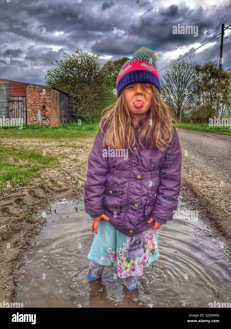 Vintage girl in a puddle hi-res stock photography and images - Alamy