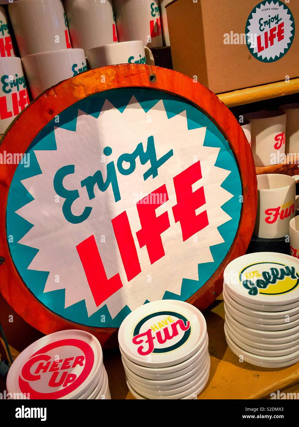 Enjoy life sign at a retail store, USA Stock Photo - Alamy
