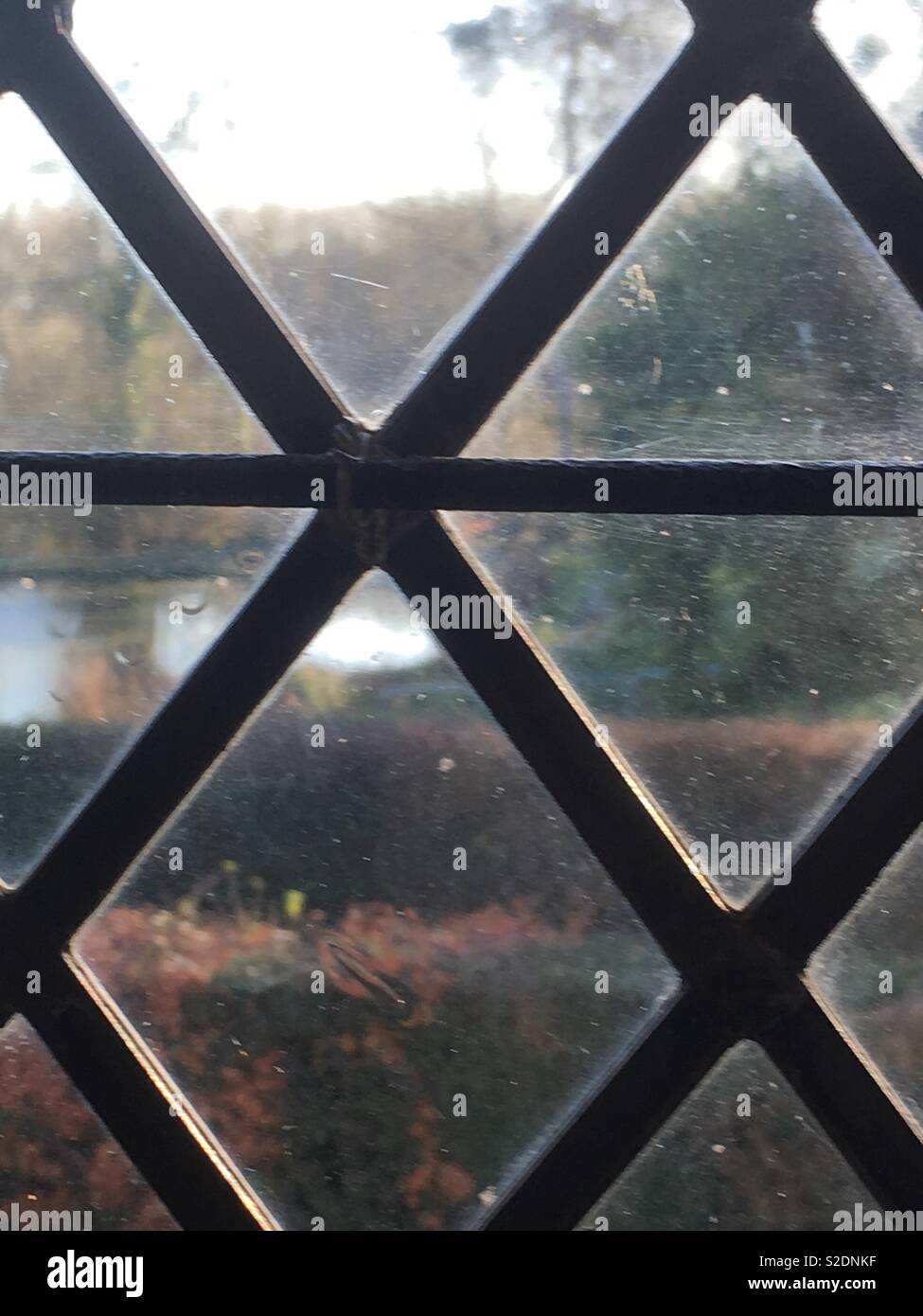 Detail of old traditional cross hatched leaded float glass clear window ...